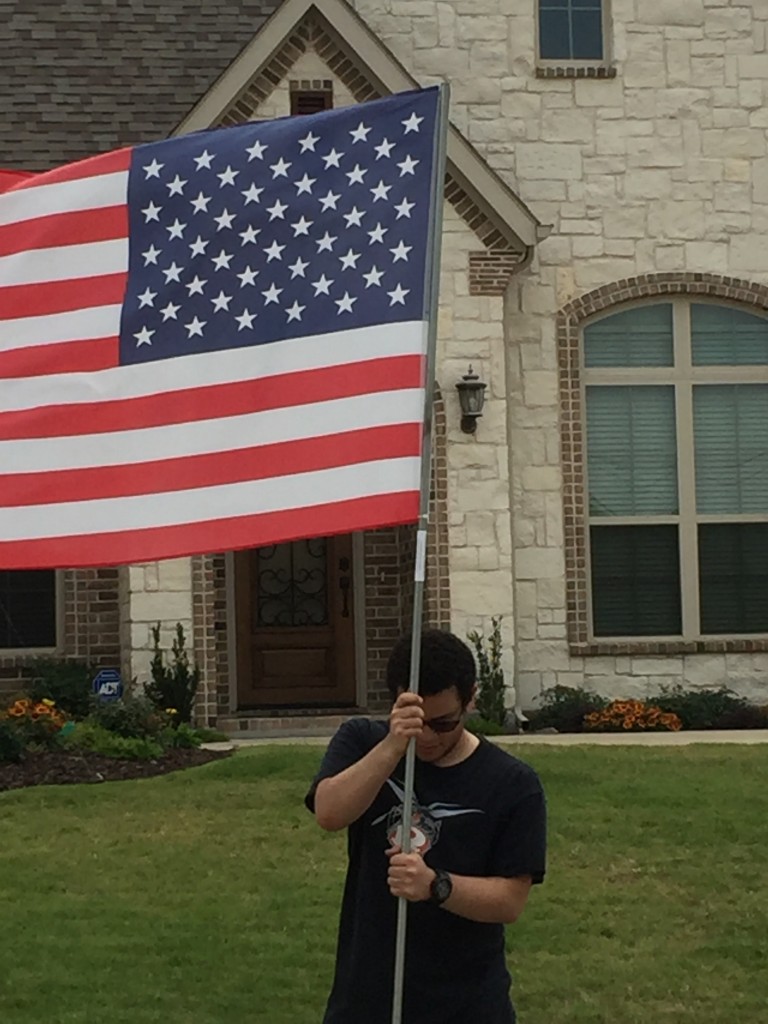 Robotics team members, Rotary place flags for holiday – Blue Ribbon News