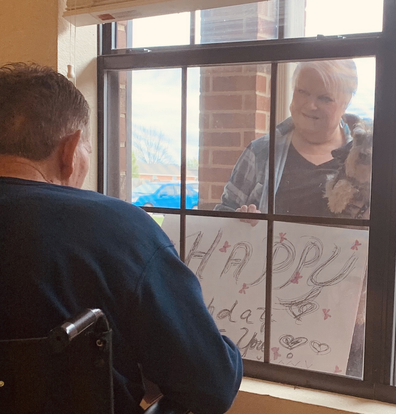 Love will find a way: Birthday celebration through a nursing home ...